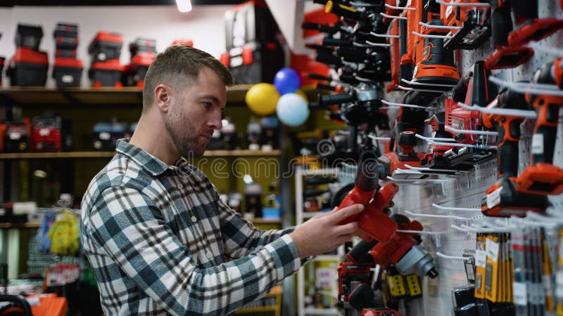 A Man Selecting a Leaf Blower in a Hardware Store Stock Video - Video ...