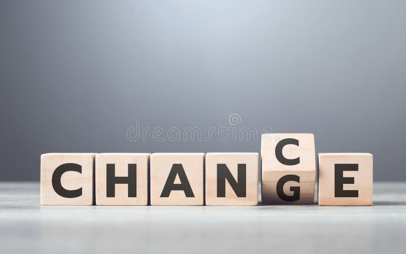 Man Selects between the Words CHANGE and CHANCE on Wooden Blocks, Stock ...