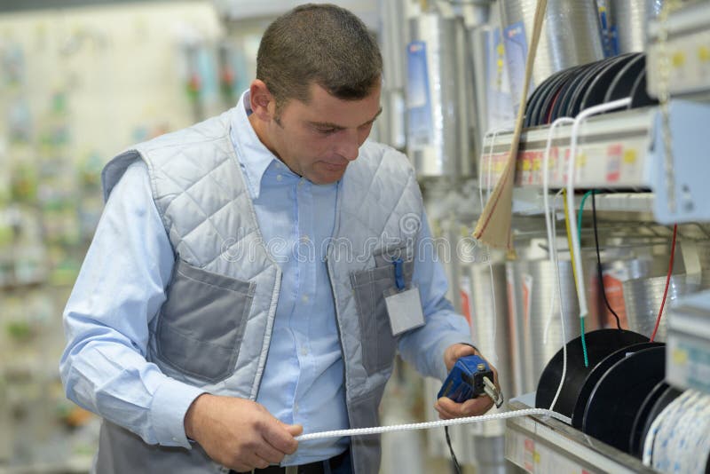 Man Seller in Hardware Store Stock Image - Image of merchandiser ...