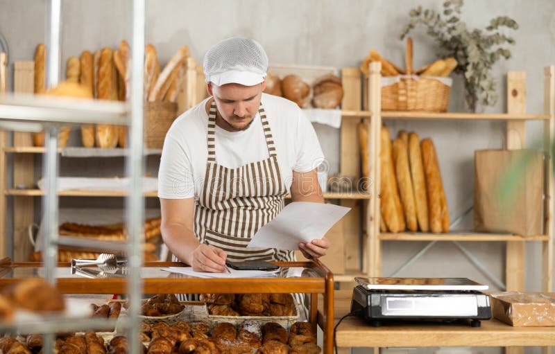 Man Seller Signing Document in Bakery Stock Image - Image of food ...