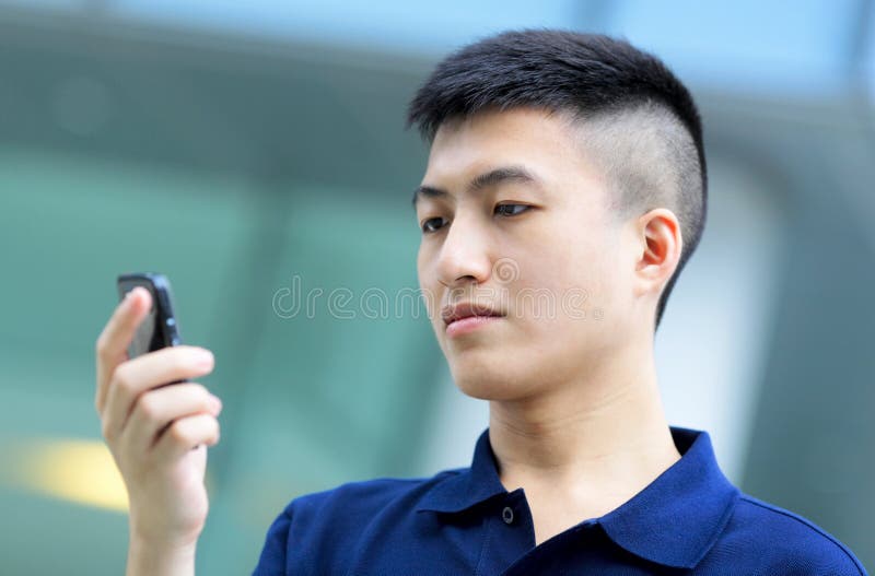 Man send message on phone stock image. Image of chinese - 27417625