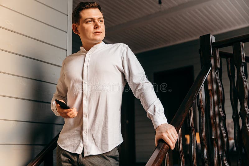 Man Send Sms by Mobile Phone. he Work from Home Stock Photo - Image of ...