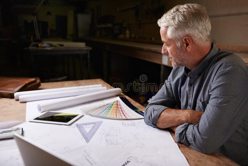 Man, Senior Architect and Blueprint Drawing in Workshop, Professional ...