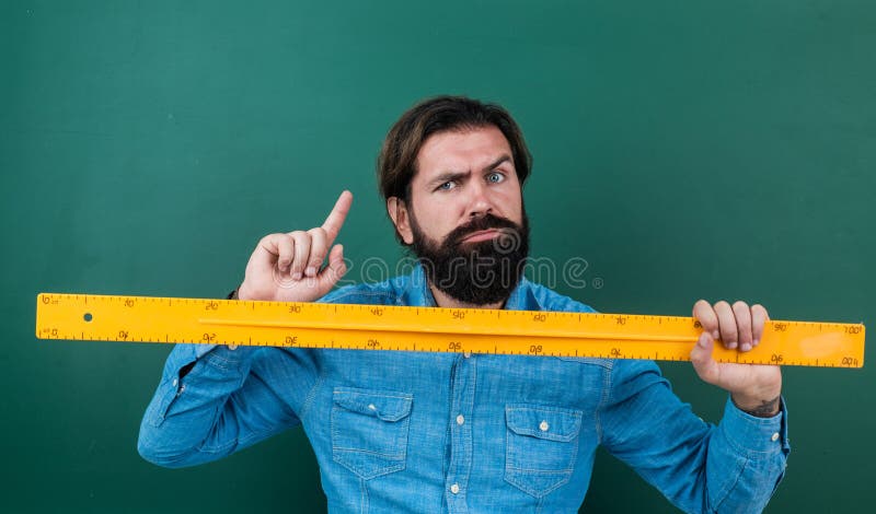 Man Serious with Size Measured on Ruler Math Tool, Inspired Teacher ...