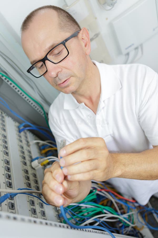 Man in server room stock photo. Image of administrator - 102271322