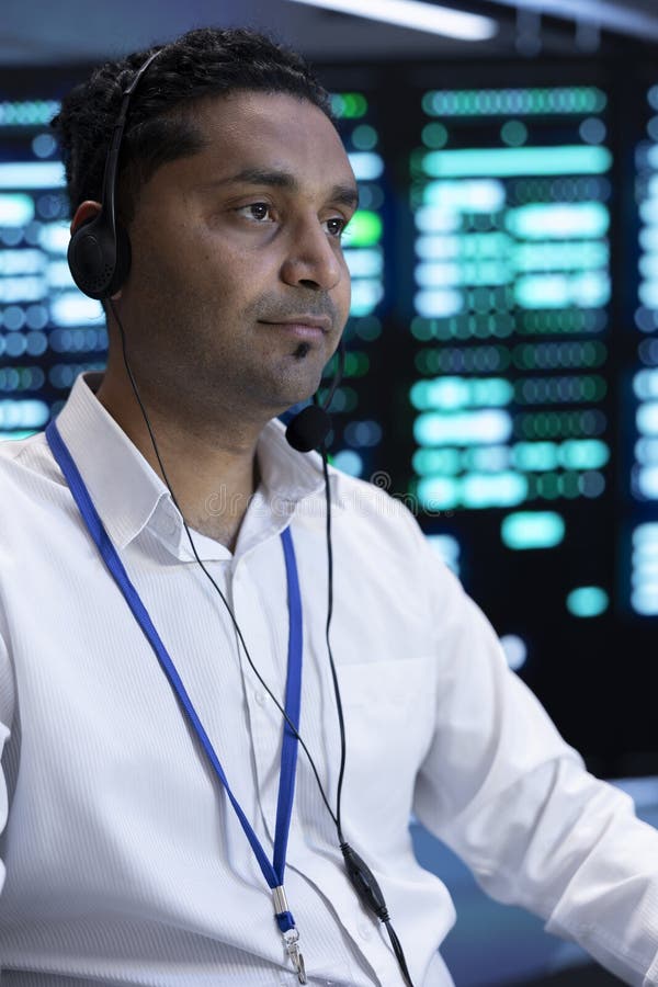 Man in Server Room Overseeing Infrastructure Systems Stock Photo - Image of bandwidth ...
