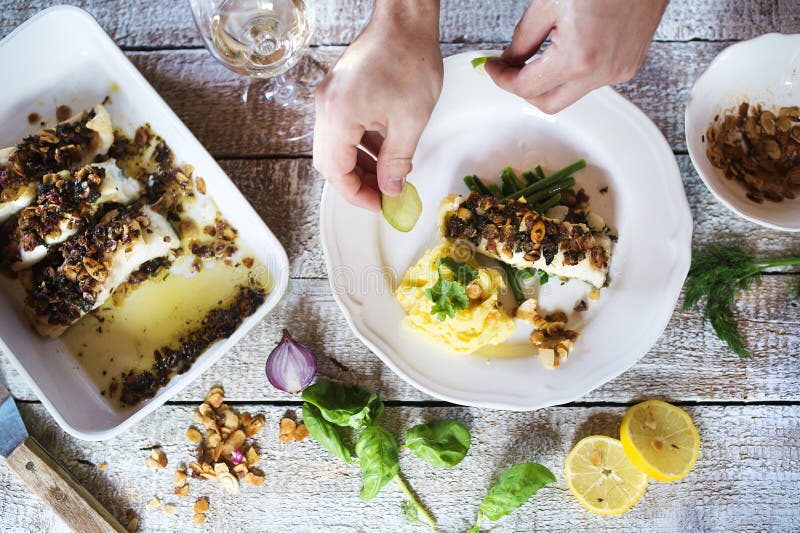 Man serving fish stock photo. Image of plate, healthy - 61037790