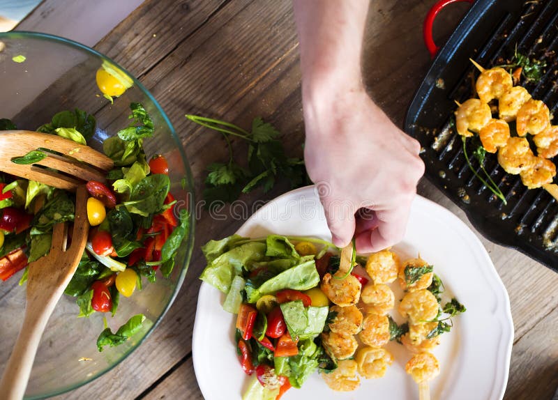 Man serving food stock photo. Image of dinner, herbs - 58423388