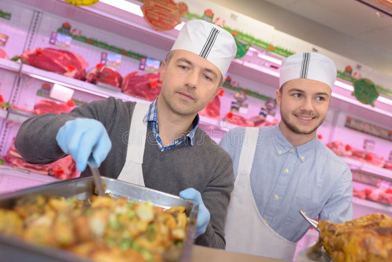 Man serving prepared food stock image. Image of serving - 171369355