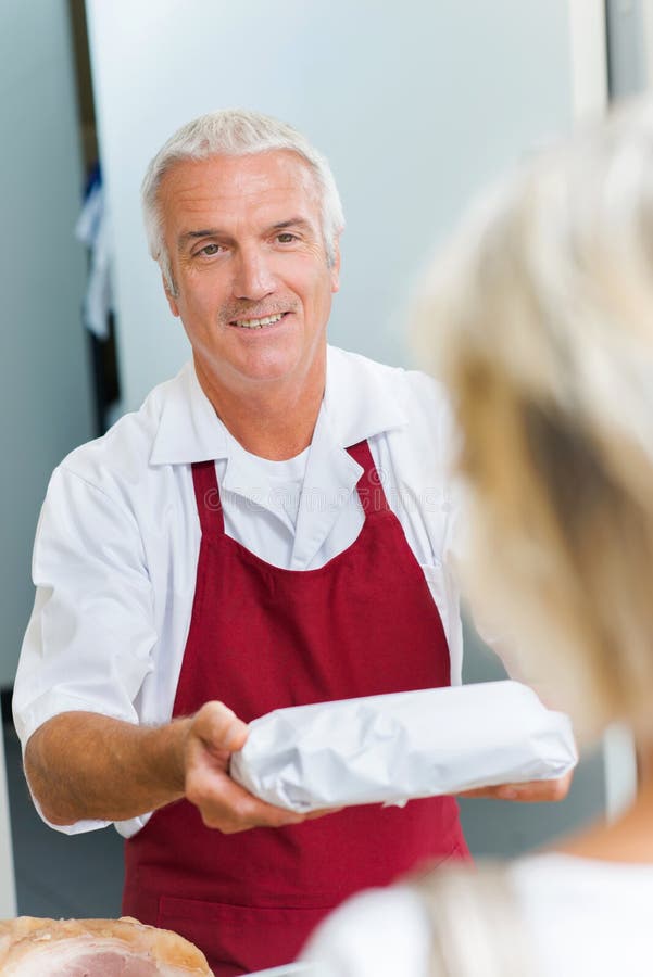 Man serving wrapped bread stock image. Image of giving - 269023281