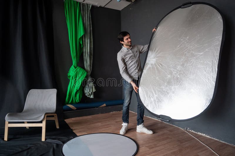 Man Setting Photographing Equipment Getting Ready for a Photo Shoot ...