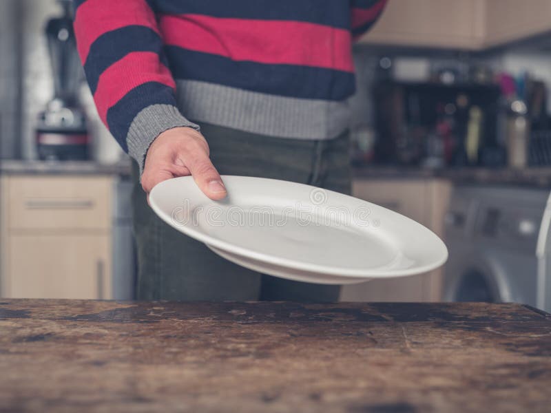 Man Setting Table at Outdoors Barbecue Stock Photo - Image of food ...