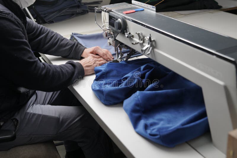 Classy sweatshop stock image. Image of furniture, machine - 219764235