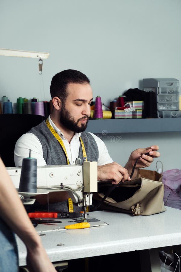 Man sewing stock image. Image of arab, fashion, workplace - 264447299