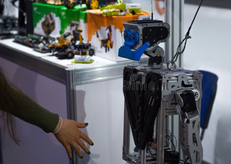 Man Shaking Hands with a Robot Stock Photo - Image of workplace ...