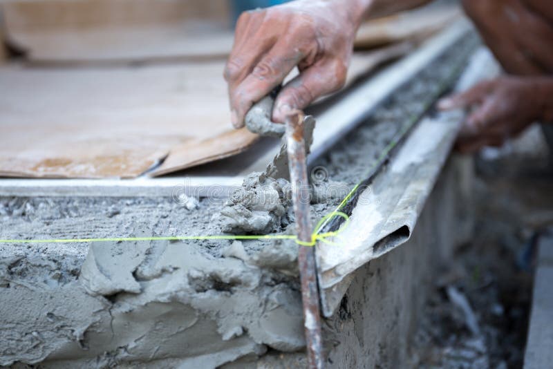 Man Shape the Edge of the Floor with Plasterer Concrete Cement Stock ...
