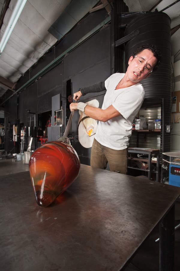 Man Shaping Glass Vase stock photo. Image of handsome - 31686216