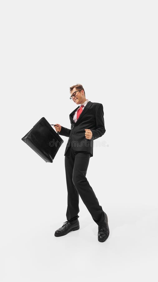 Man in Sharp Black Suit and Red Tie Striking Exaggerated Confident Pose ...