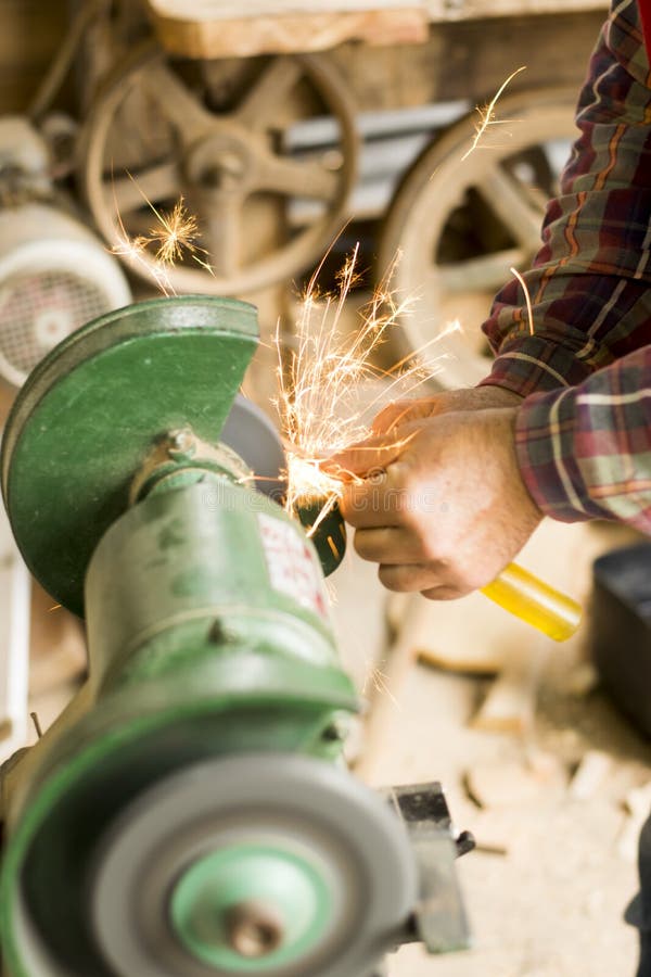 Man sharpening tool stock photo. Image of board, ancient - 63133354