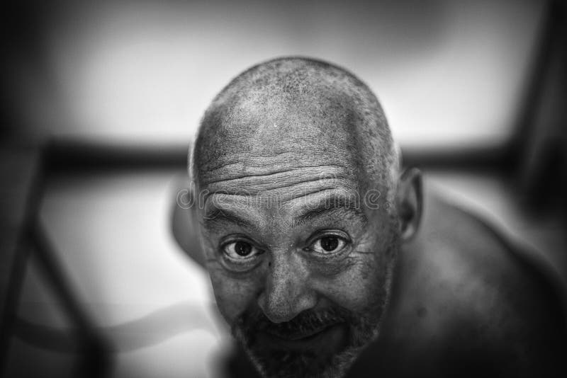 Man with a Shaved Head and a Disturbing Gaze Stock Image - Image of ...