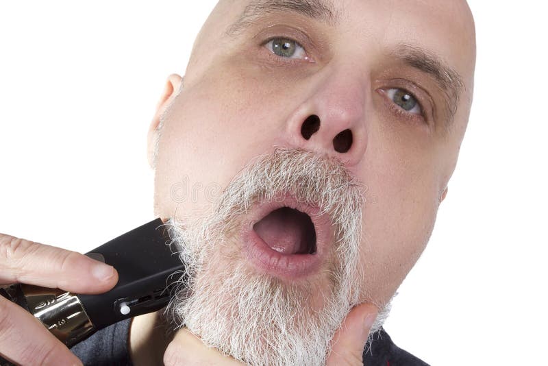 Man shaves his beard stock image. Image of hygiene, beard - 140443151 Man shaves his beard stock image. Image of hygiene, beard - 140443151