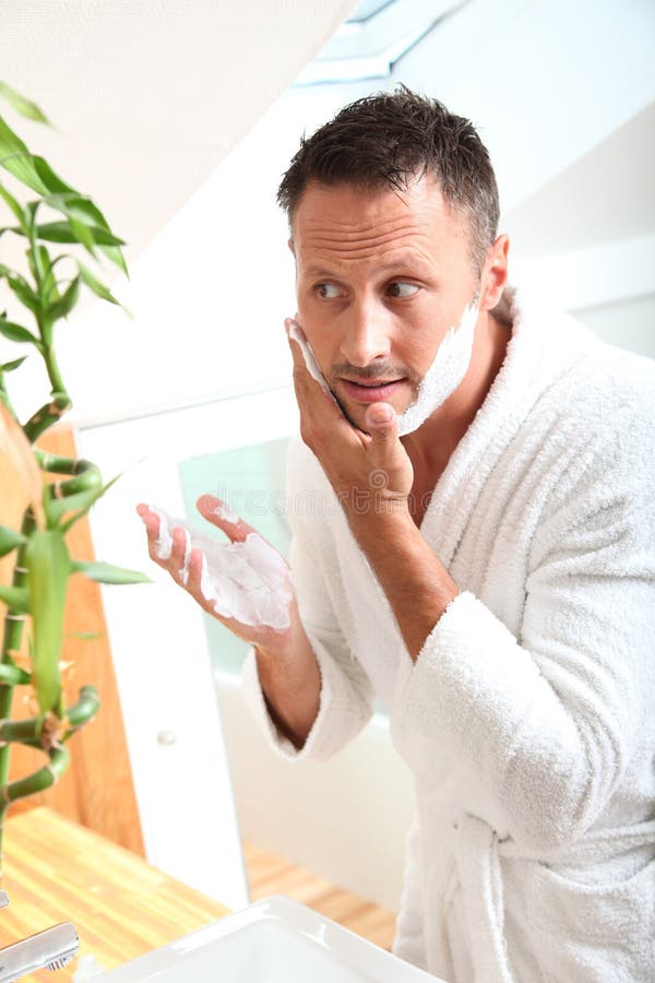 Man shaving stock photo. Image of cosmetics, foam, indoors - 15586506