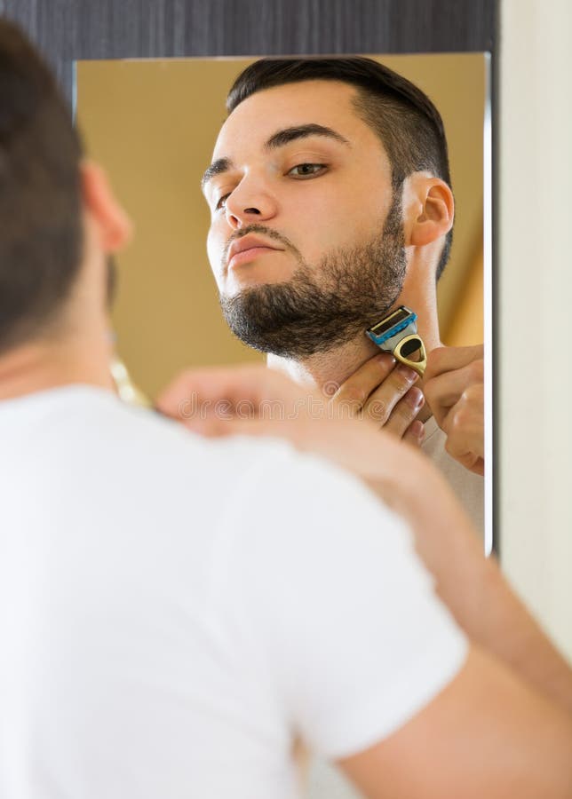 Man Shaving the Beard with a Razor Stock Image - Image of attractive ...