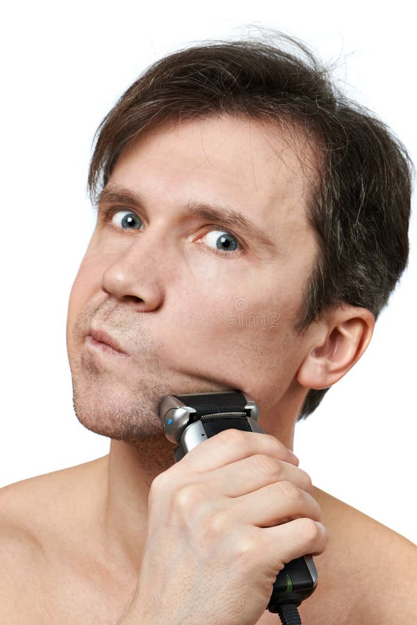 Man Shaving Face with Electric Razor Stock Photo - Image of lifestyle ...