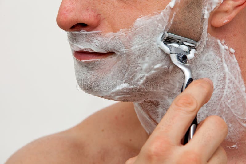 Man shaving his beard stock image. Image of razorblade - 13027339