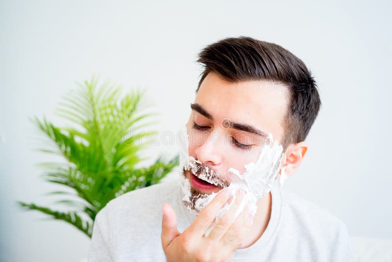 Man shaving his beard stock image. Image of body, hair - 92091811