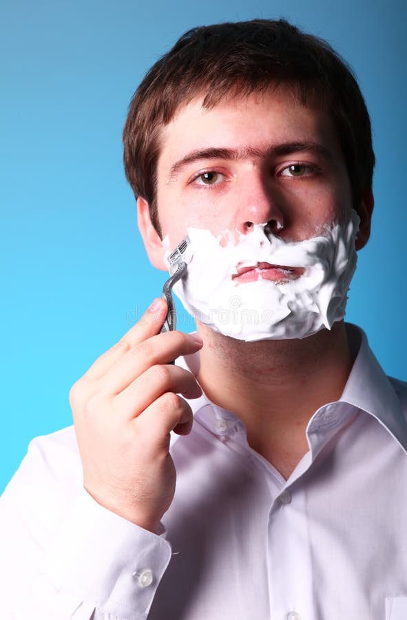 Man Shaving Isolated On Blue Background Stock Image - Image of natural ...