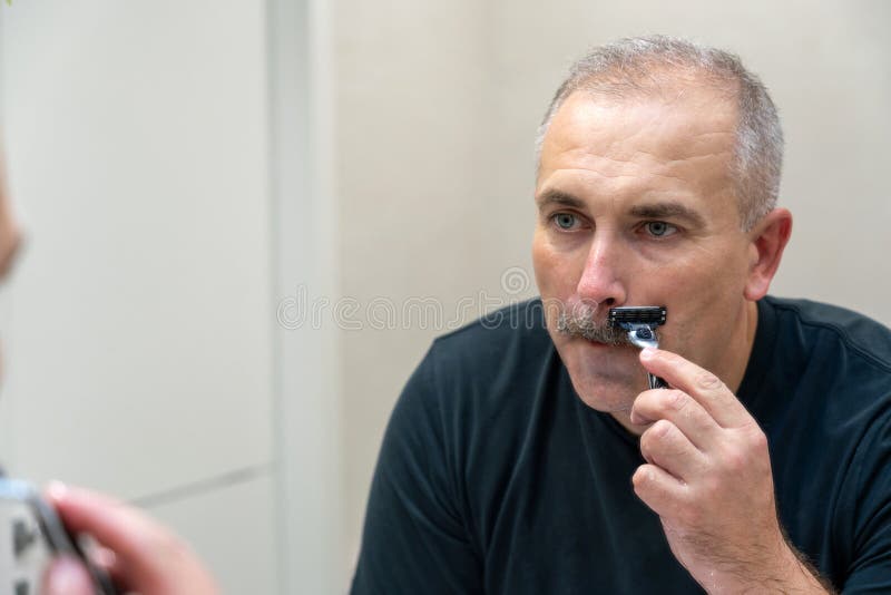 Man Shaving with Razor Using Foam in Bathroom in the Morning Stock ...