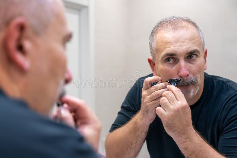Man Shaving with Razor Using Foam in Bathroom in the Morning Stock ...