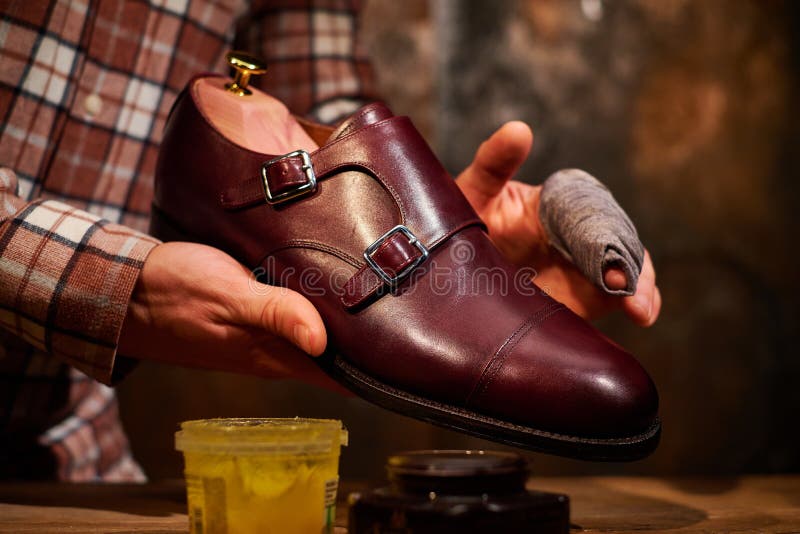Man Shining Shoes with a Rag Stock Image - Image of person, color: 81467911