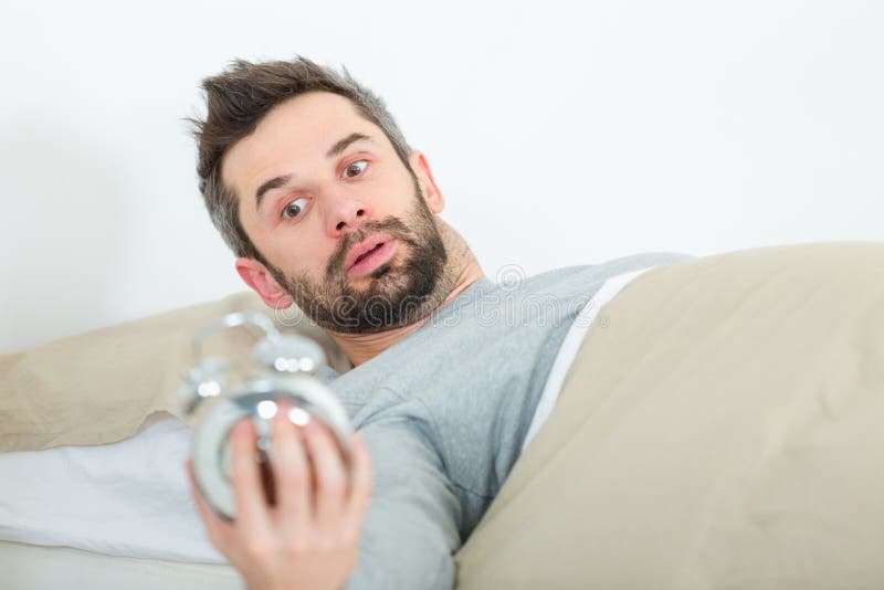 Young angry man waking up stock image. Image of suffer - 165454835