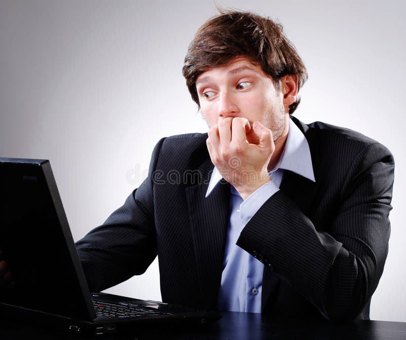 Man Shocked Looking at Computer Stock Photo - Image of stress ...