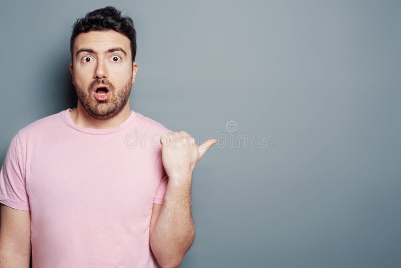 Funny Man on Gray Background Pointing Copy Space Stock Image - Image of ...