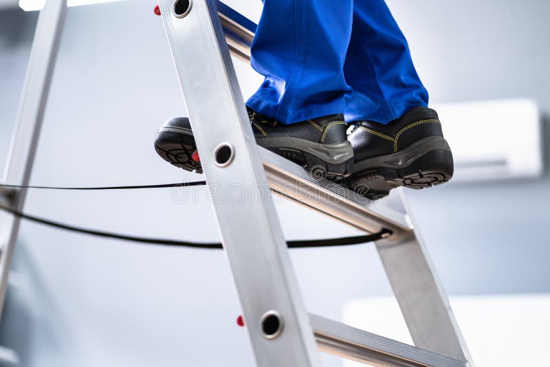 Man in Shoes Climbing Step Ladder. Safety Stock Photo - Image of ...