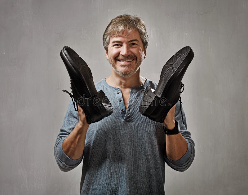 Man with shoes. stock photo. Image of person, glad, mode - 79952600