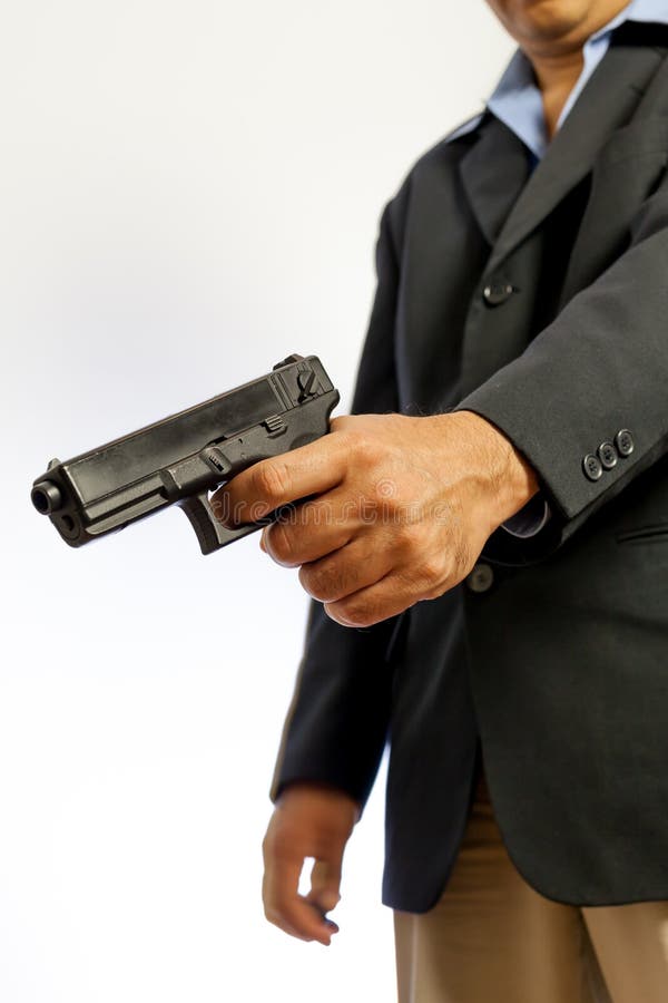 Man shooting a gun stock photo. Image of character, handgun - 25430766