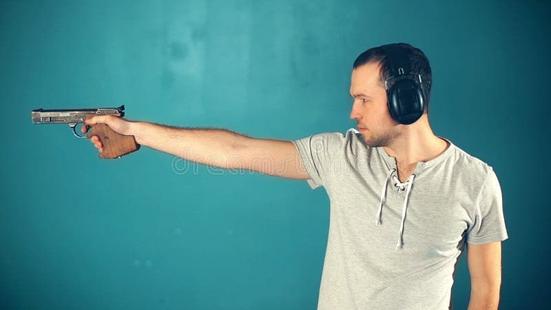 Man shooting with gun stock footage. Video of outlaw - 73538306