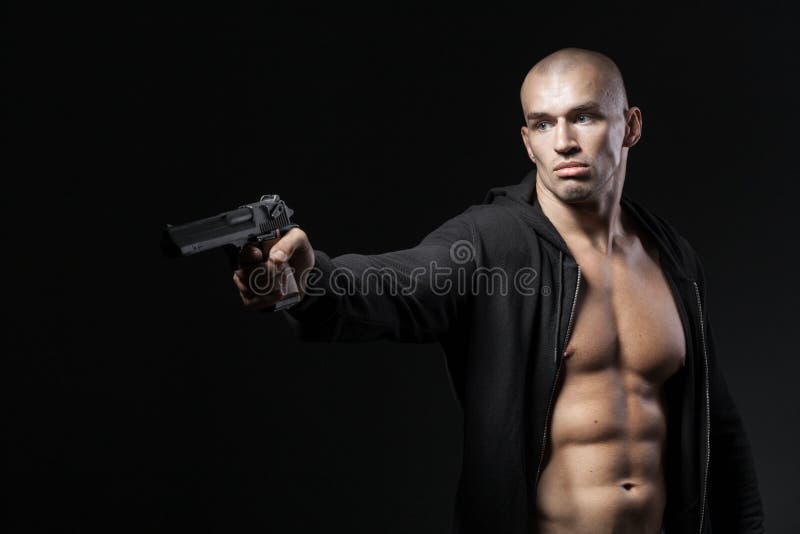Man Shooting Gun Isolated on Black Stock Image - Image of cutout, armed ...