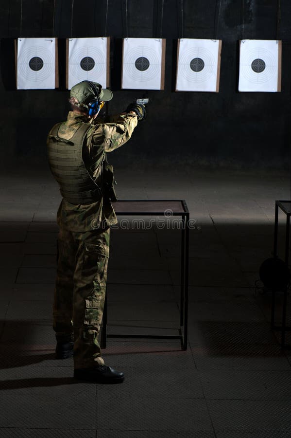 Man shooting stock photo. Image of ammo, male, concentration - 46005638