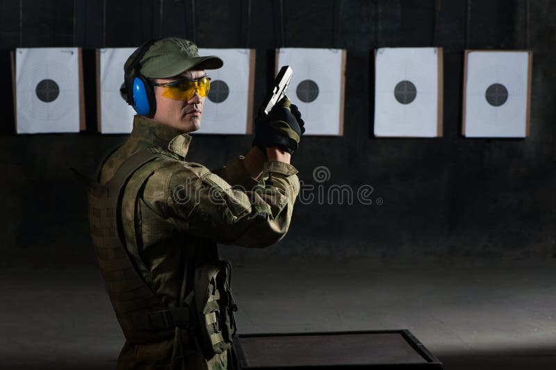 Man shooting stock image. Image of ammunition, aiming - 46005677
