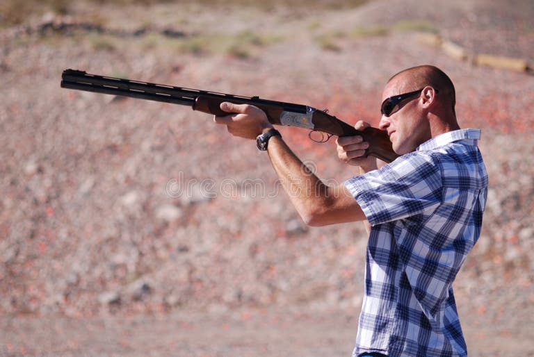 Man shooting shot gun. stock image. Image of hobby, clays - 5433167