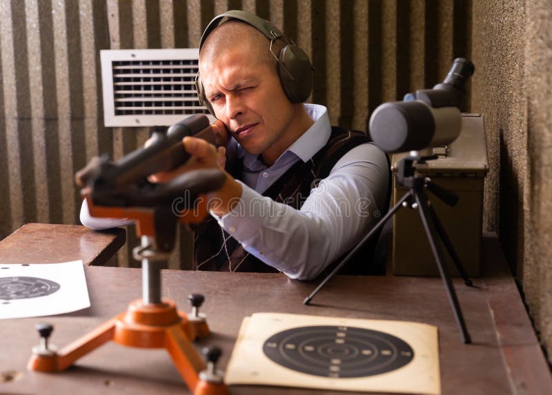 Man Shoots Semi-automatic Rifle at Shooting Range Stock Image - Image ...