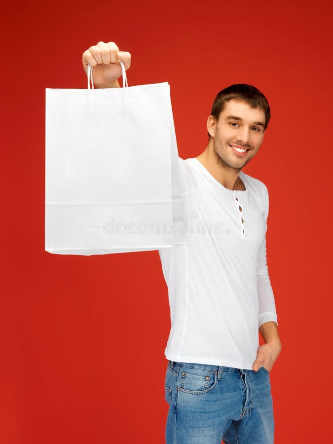 Man with shopping bags stock photo. Image of buyer, dude - 39406252