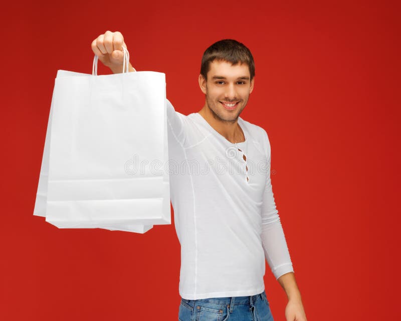 Man with shopping bags stock photo. Image of people, buyer - 39408082