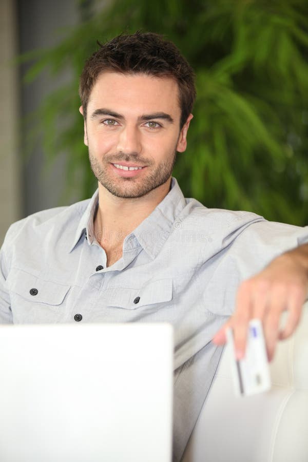 Man shopping on-line stock photo. Image of buying, home - 25433618
