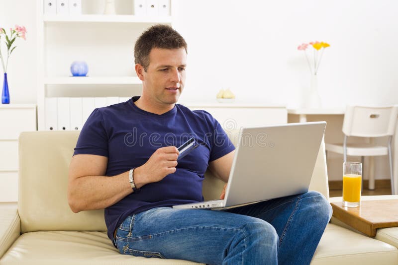 Man shopping online stock image. Image of communication - 9019507